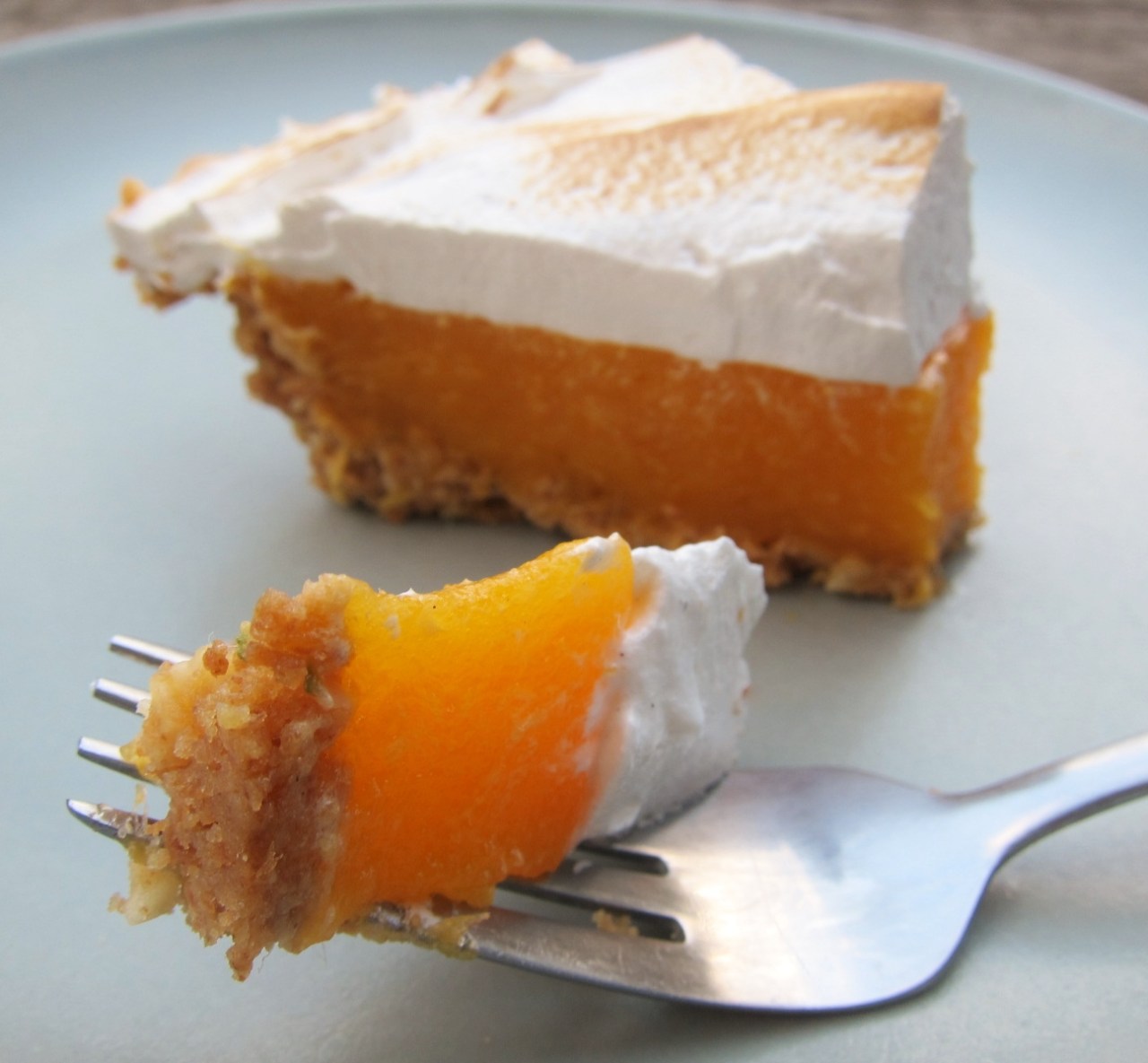 Mango Meringue Pie with Coconut Macadamia Crust | butter, sugar, flowers