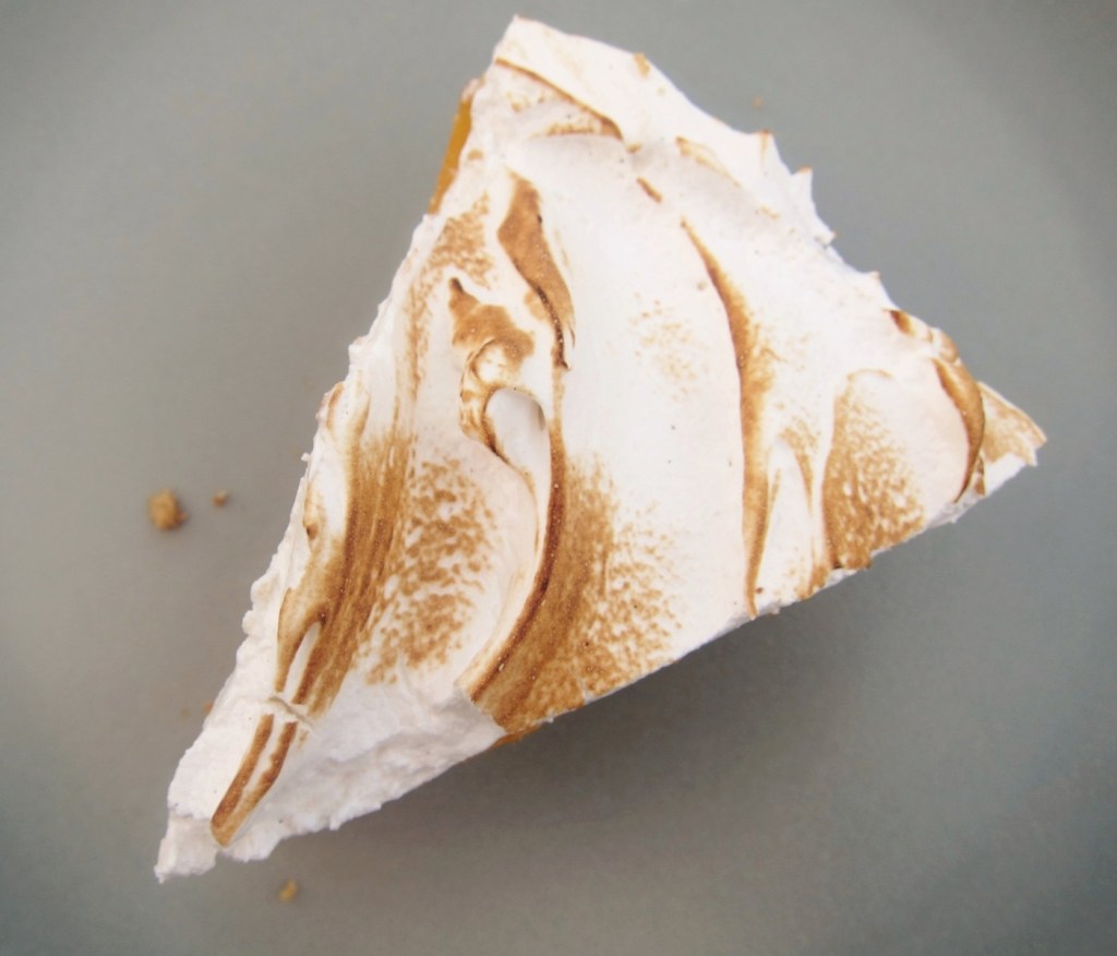 Mango Meringue Pie with Coconut Macadamia Crust | butter, sugar, flowers